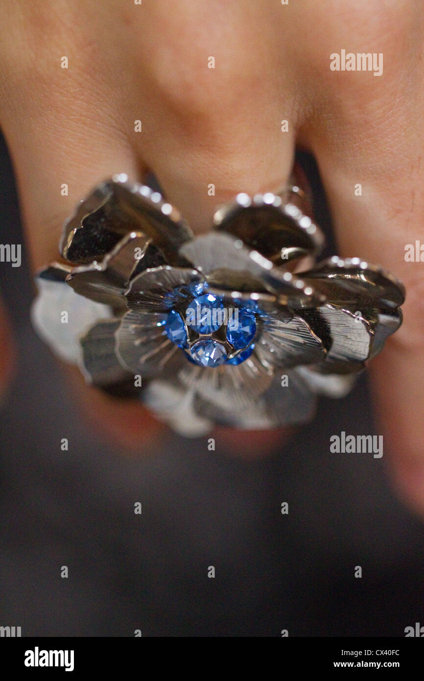 Woman's Hand with Flower Ring Stock Photo - Alamy