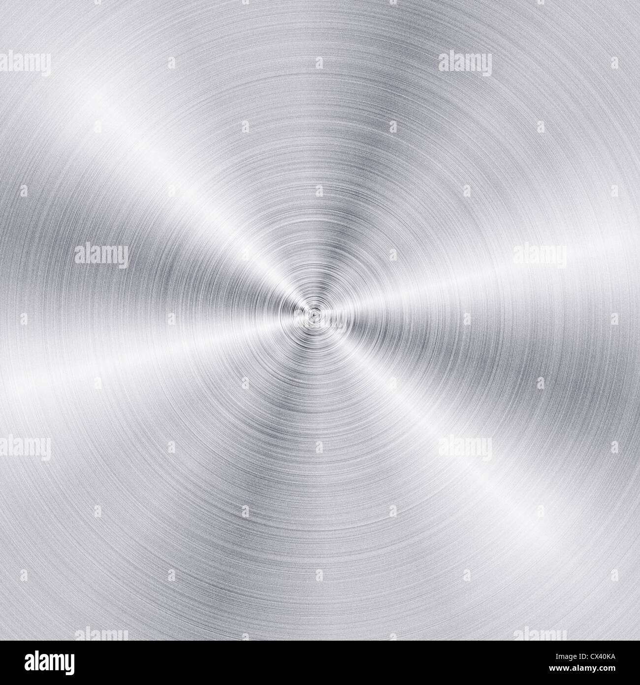 Background of brushed metal plate with reflections in circular shape ...