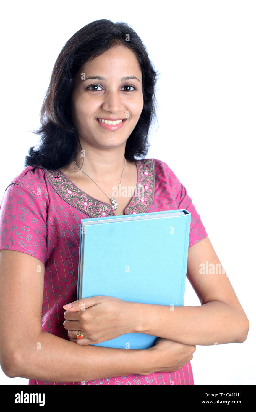 Happy Indian female college student against white Stock Photo - Alamy