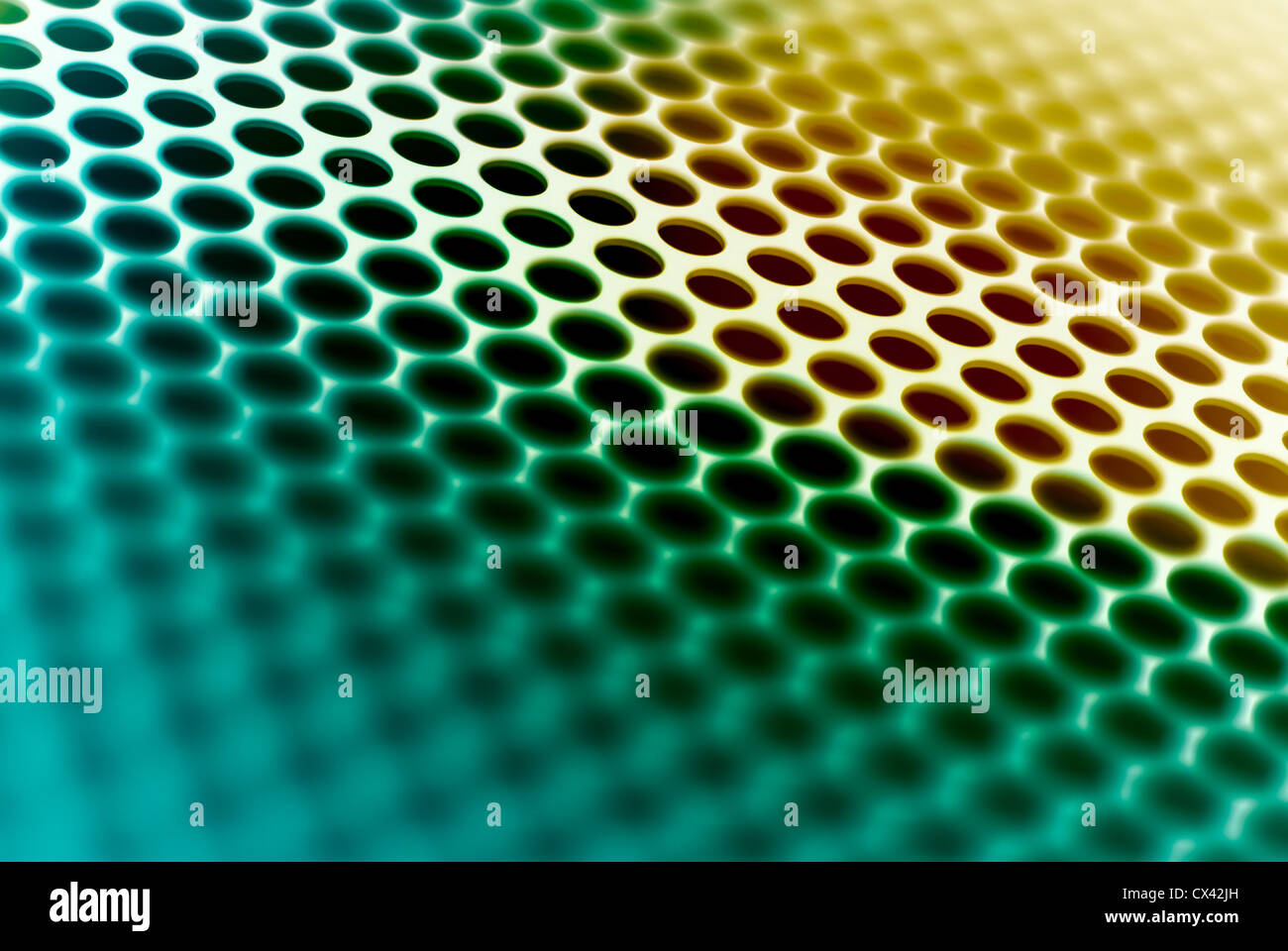 A metalic reflective surface lit by a colorful light Stock Photo - Alamy