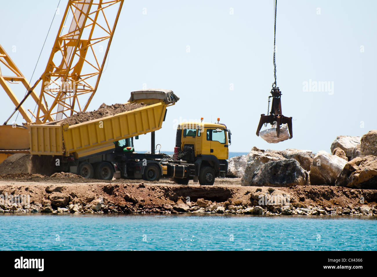 Carrying stones hi-res stock photography and images - Alamy
