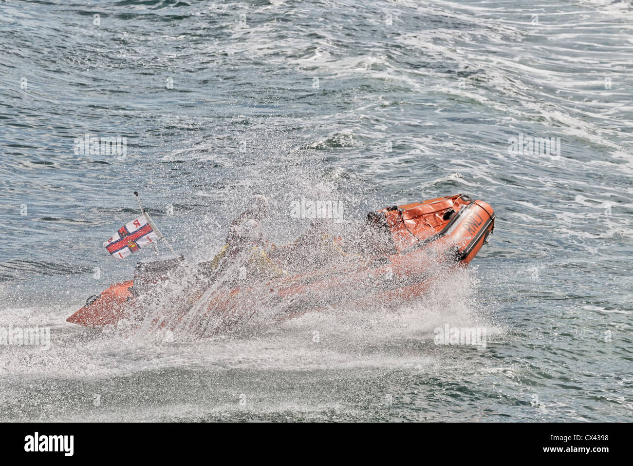Crashing through the surf Cromer inshore Lifeboat to the rescue Stock ...