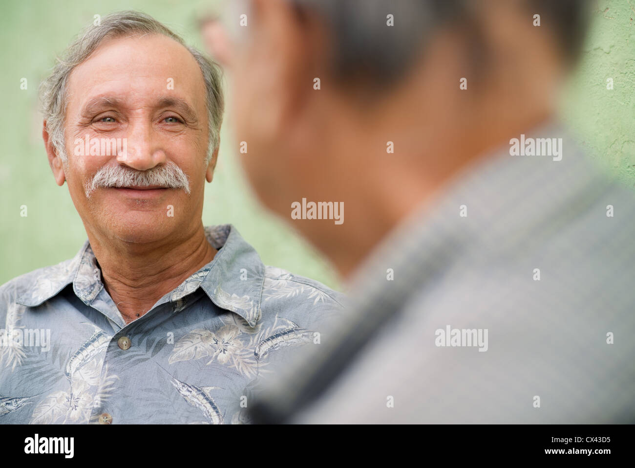 Retired elderly people and friendship, two old men meeting and talking ...