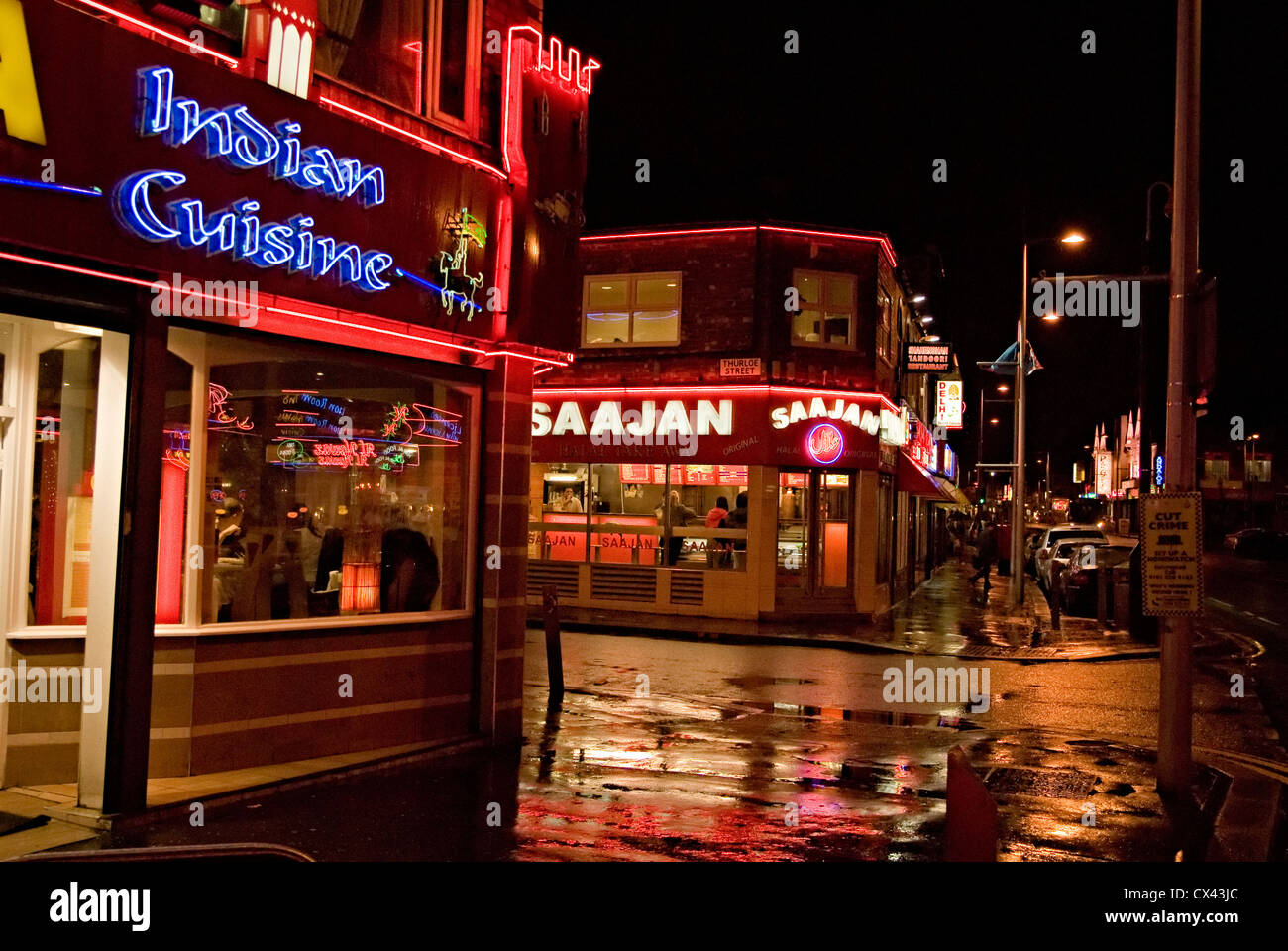 Manchester curry mile rusholme wimslow road with neon shop signs Stock ...