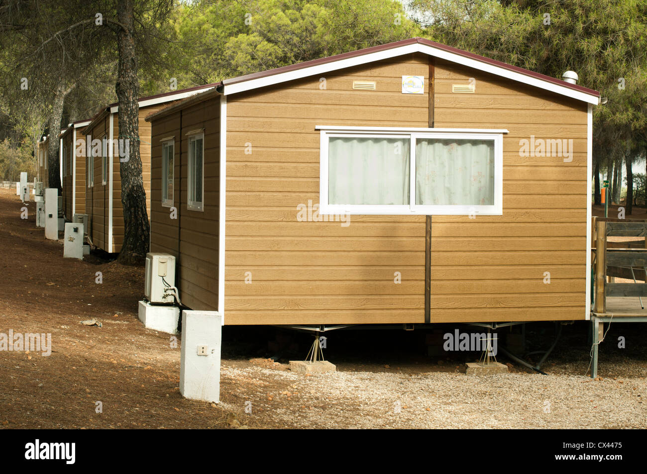 Mobile homes, brown bungalow in a camping Stock Photo - Alamy