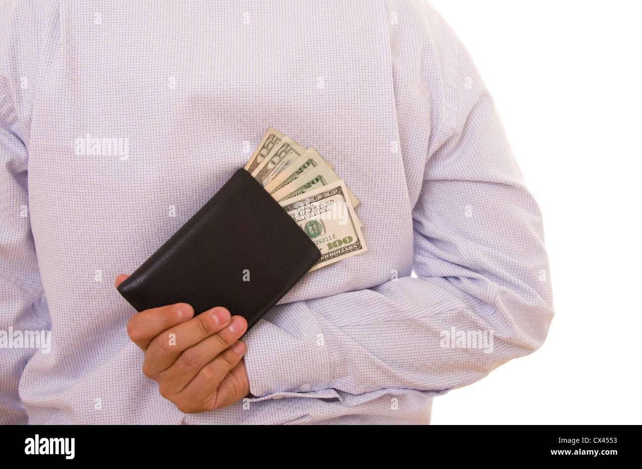 A man hiding a wallet on his back Stock Photo - Alamy