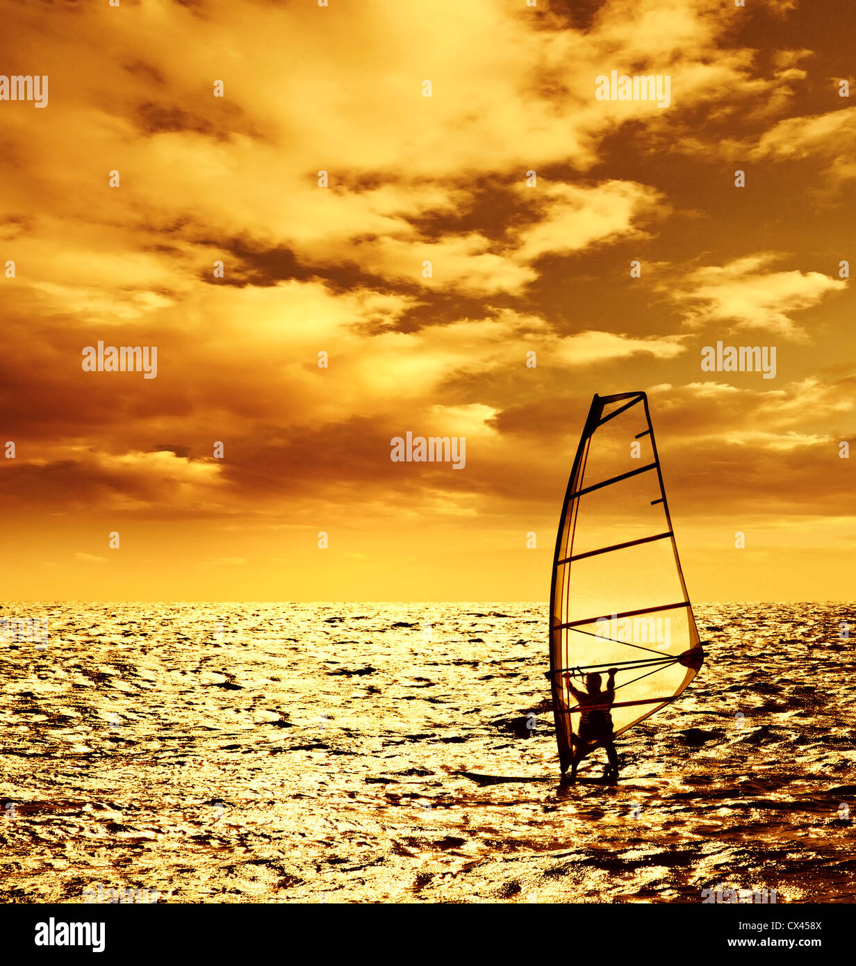 Photo of silhouette windsurfer over sunset, water sport, beautiful ...