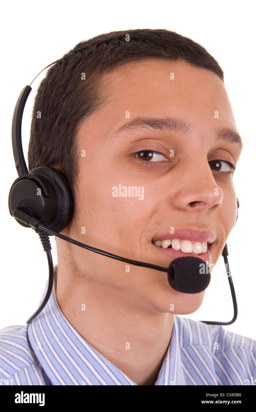 Young man smiling with telephone headset Stock Photo - Alamy