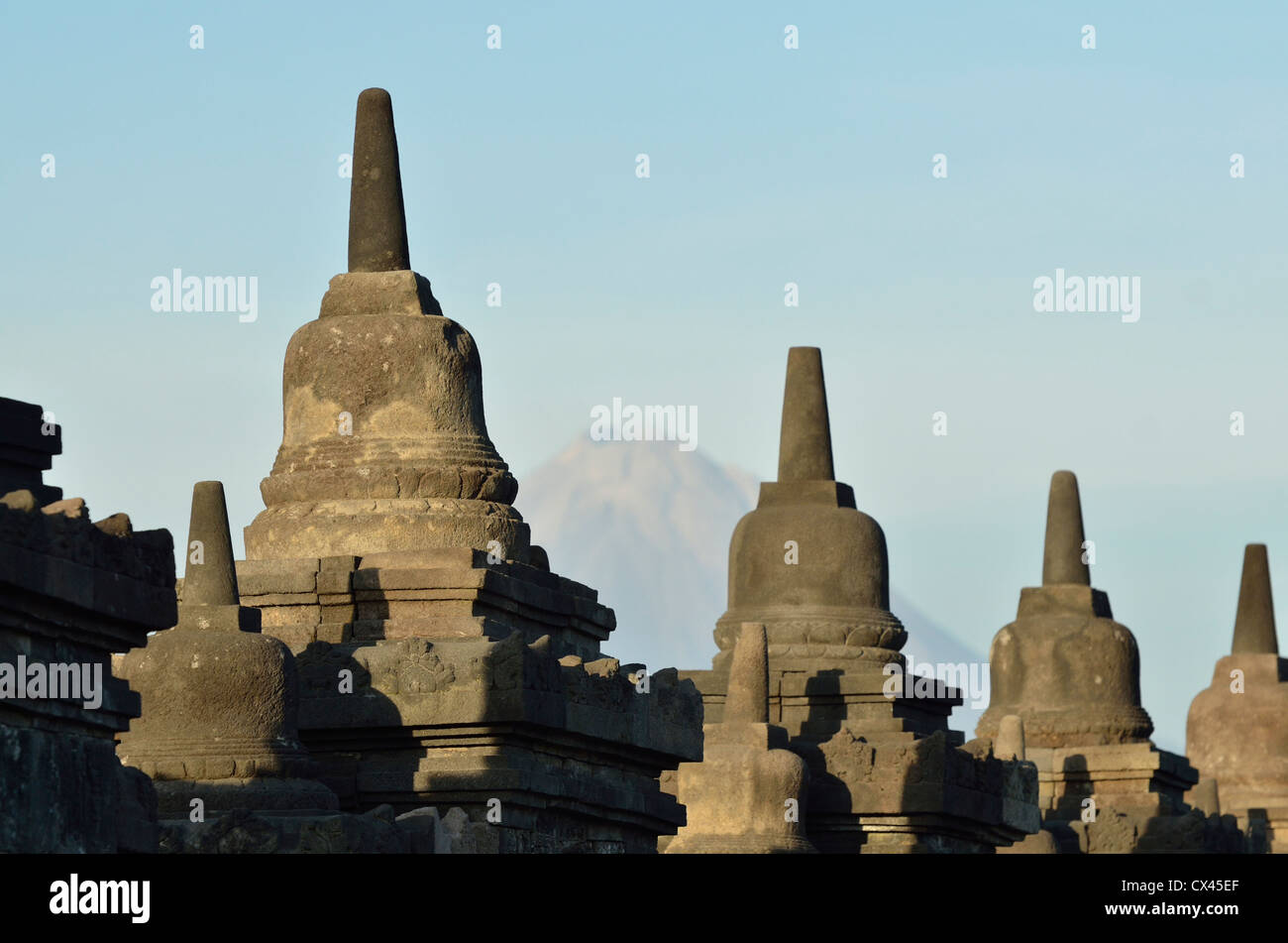 The stupa and the Merapi at the gorgeous buddhist temple of Borobudur ...