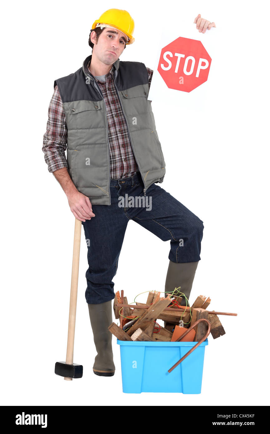 Stop sign construction man hard Cut Out Stock Images & Pictures - Alamy