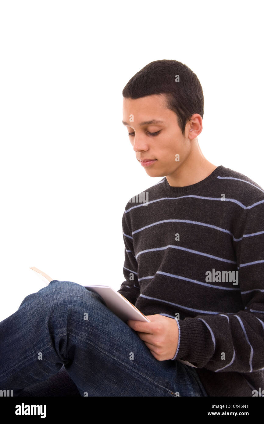 A young student reading a book Stock Photo - Alamy