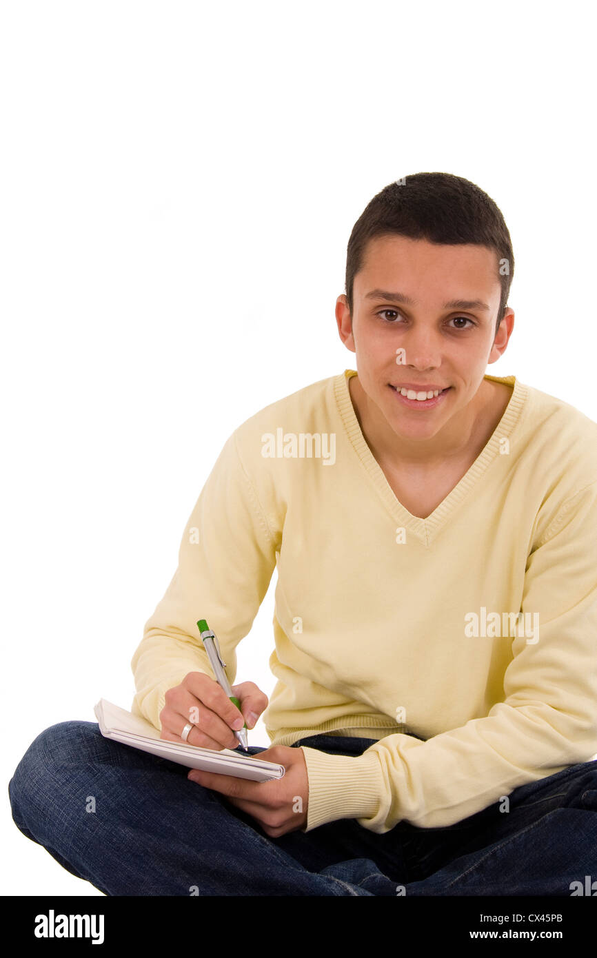 Happy student doing his homework Stock Photo - Alamy