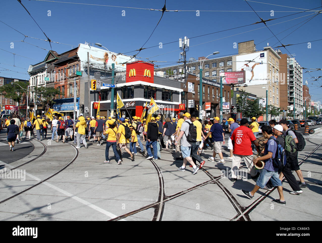 People marching in the streets of Toronto during the annual Labor Day ...