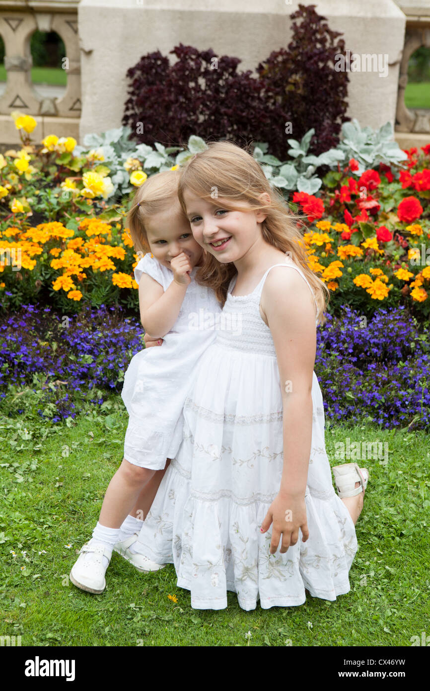 two happy girls - sisters Stock Photo - Alamy
