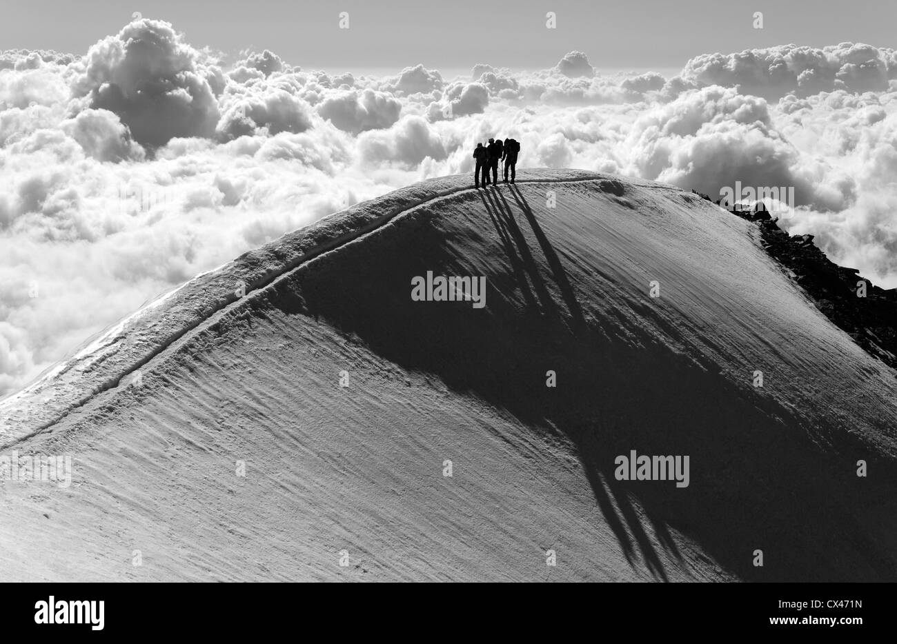 Climbers on a classic alpine peak Black and White Stock Photos & Images ...