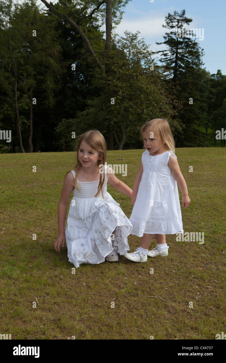 two happy girls - sisters Stock Photo - Alamy