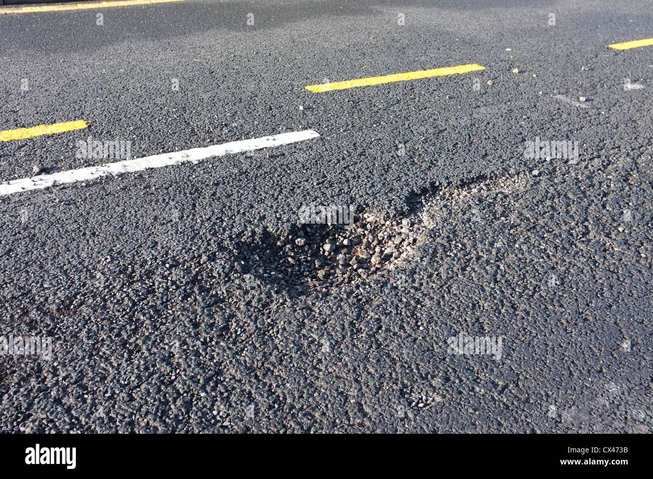 Potholes in roads in Leeds Stock Photo - Alamy