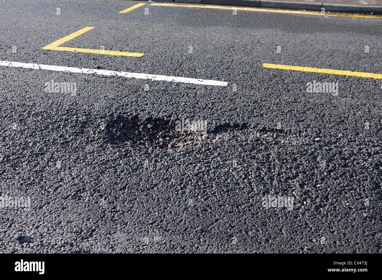 Potholes in roads in Leeds Stock Photo - Alamy