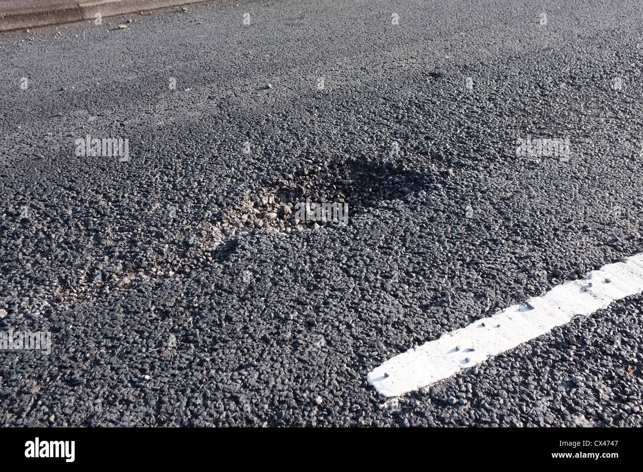 Potholes in roads in Leeds Stock Photo - Alamy
