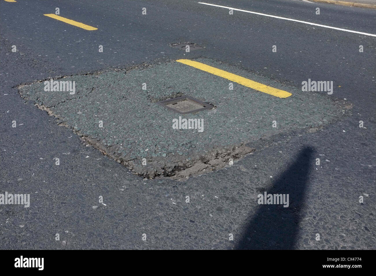 Potholes in roads in Leeds Stock Photo - Alamy