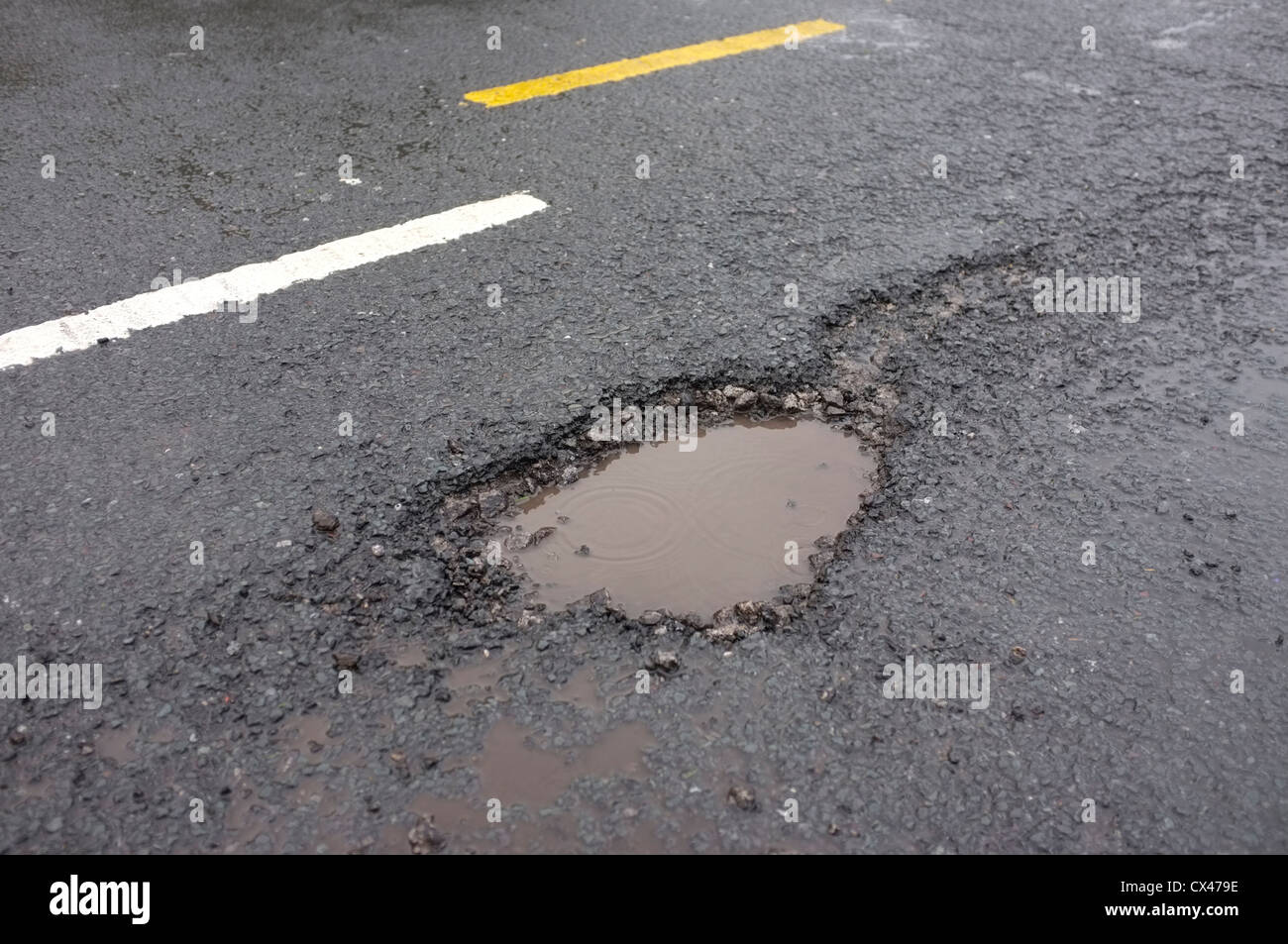 Potholes in roads in Leeds Stock Photo - Alamy