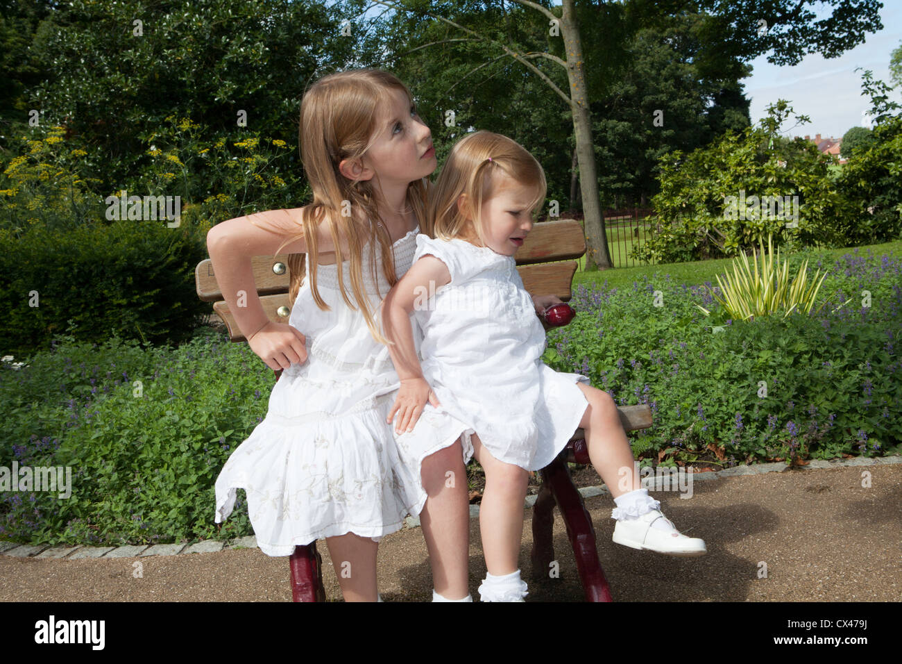 two happy girls - sisters Stock Photo - Alamy
