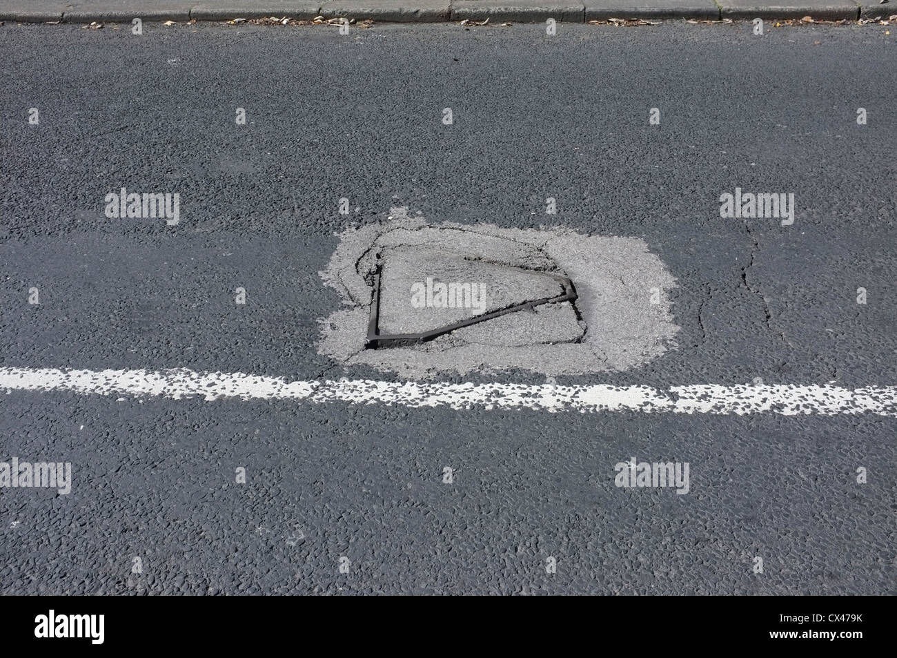 Potholes in roads in Leeds Stock Photo - Alamy