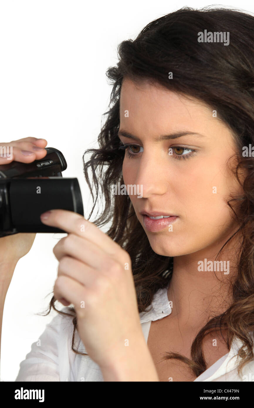 Woman holding a camcorder Stock Photo - Alamy