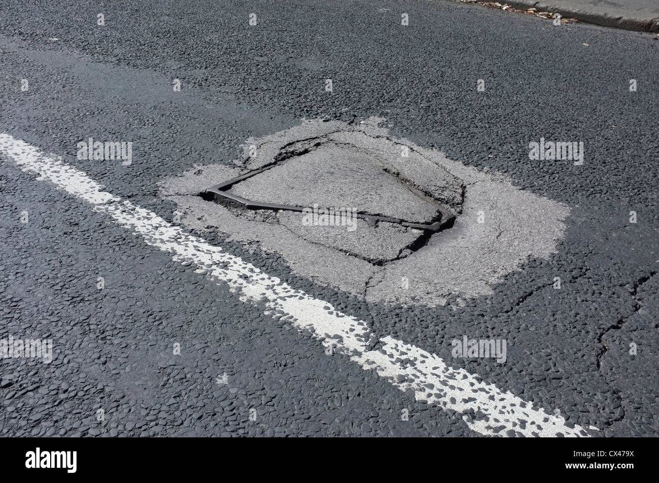 Potholes in roads in Leeds, Yorkshire, UK Stock Photo - Alamy