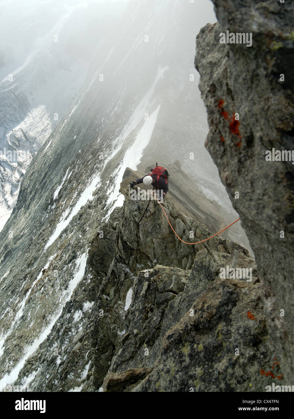 A climber on the traverse of Mont Blanc de Cheilon Stock Photo - Alamy