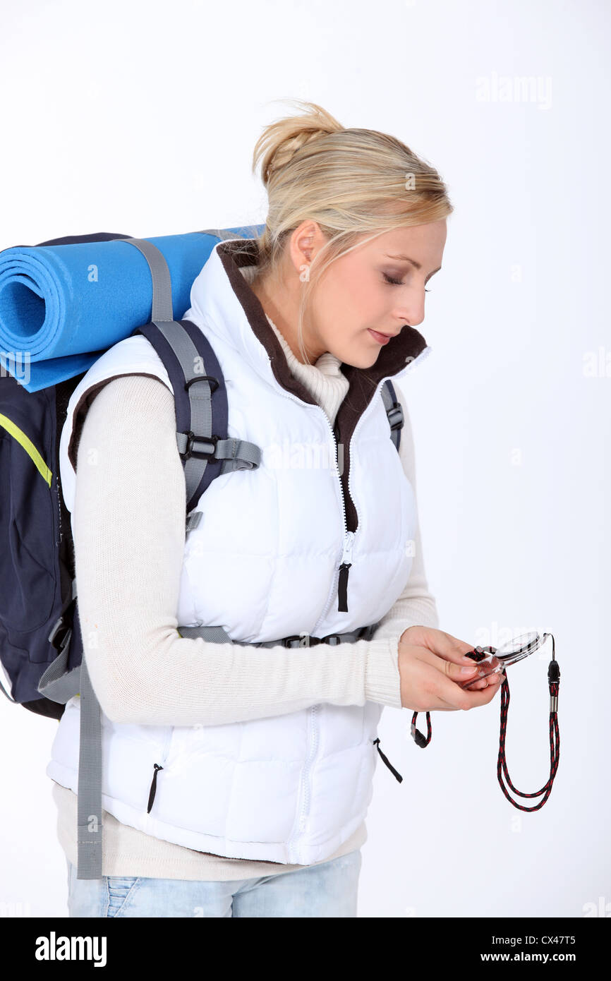 Blonde girl with compass Stock Photo - Alamy