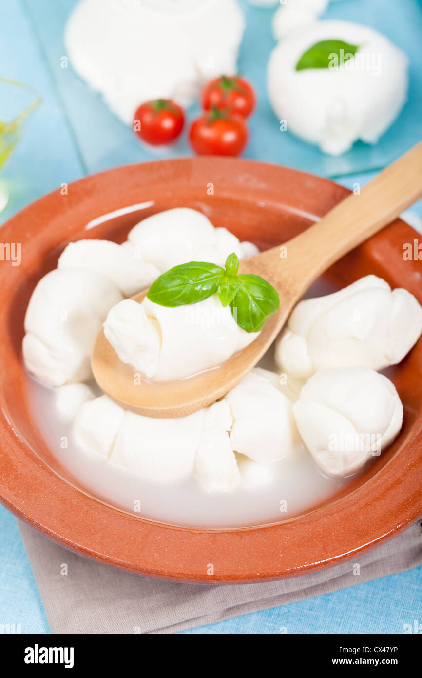 Fresh italian dairy products in earthenware pot Stock Photo - Alamy