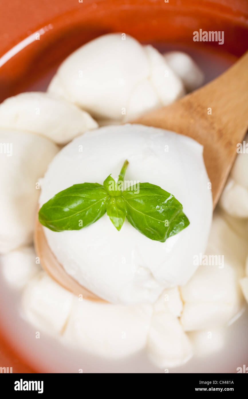 Fresh italian dairy products in earthenware pot Stock Photo - Alamy