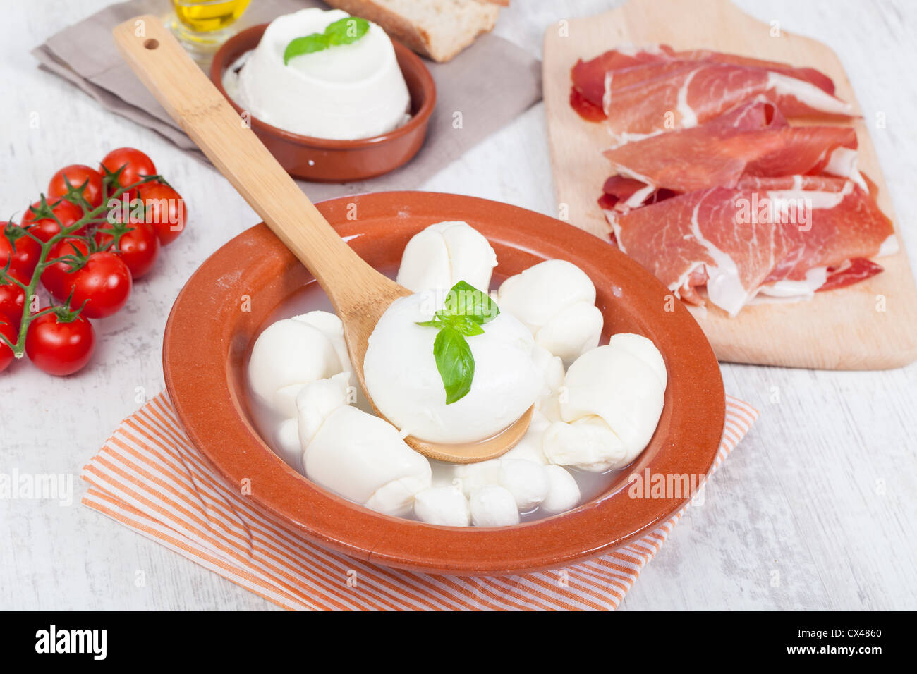 Fresh italian dairy products in earthenware pot Stock Photo - Alamy