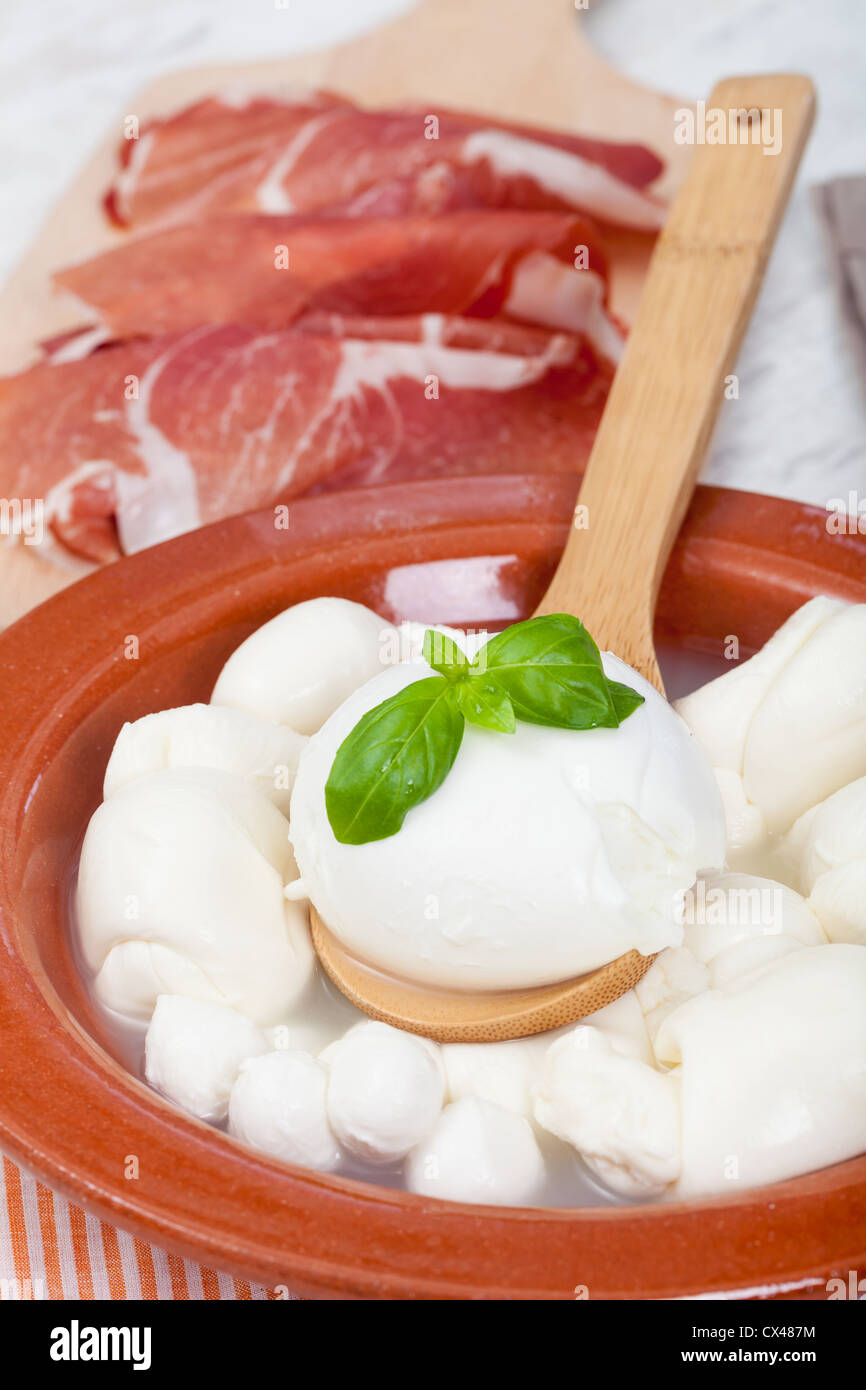 Fresh italian dairy products in earthenware pot Stock Photo - Alamy