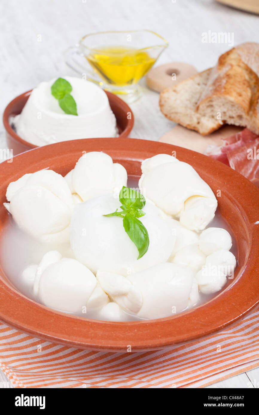 Fresh italian dairy products in earthenware pot Stock Photo - Alamy