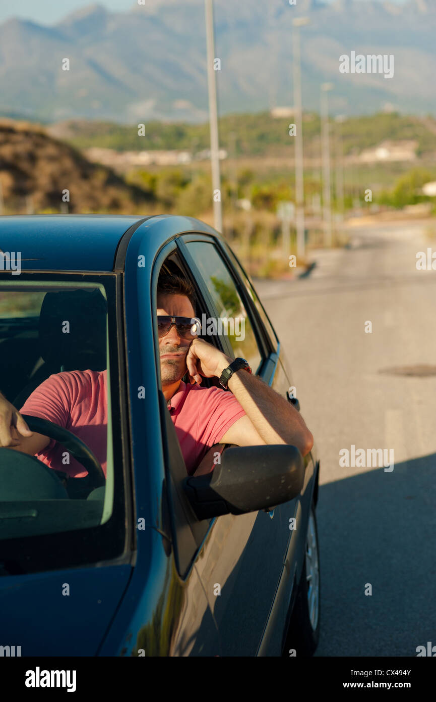 Frustrated driver waiting at some kind of traffic jam Stock Photo - Alamy