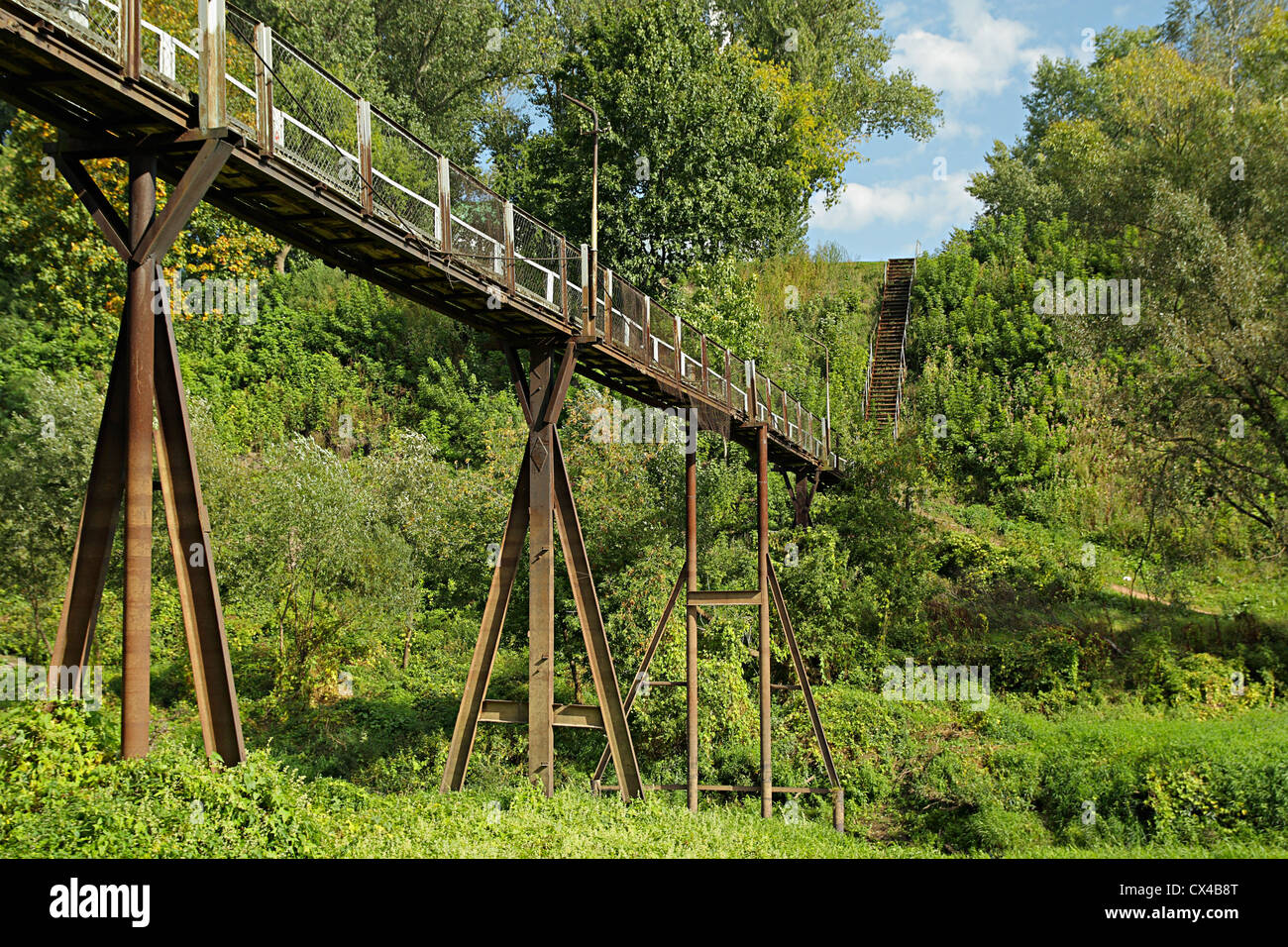 Old metallic rusty footbridge Stock Photo - Alamy