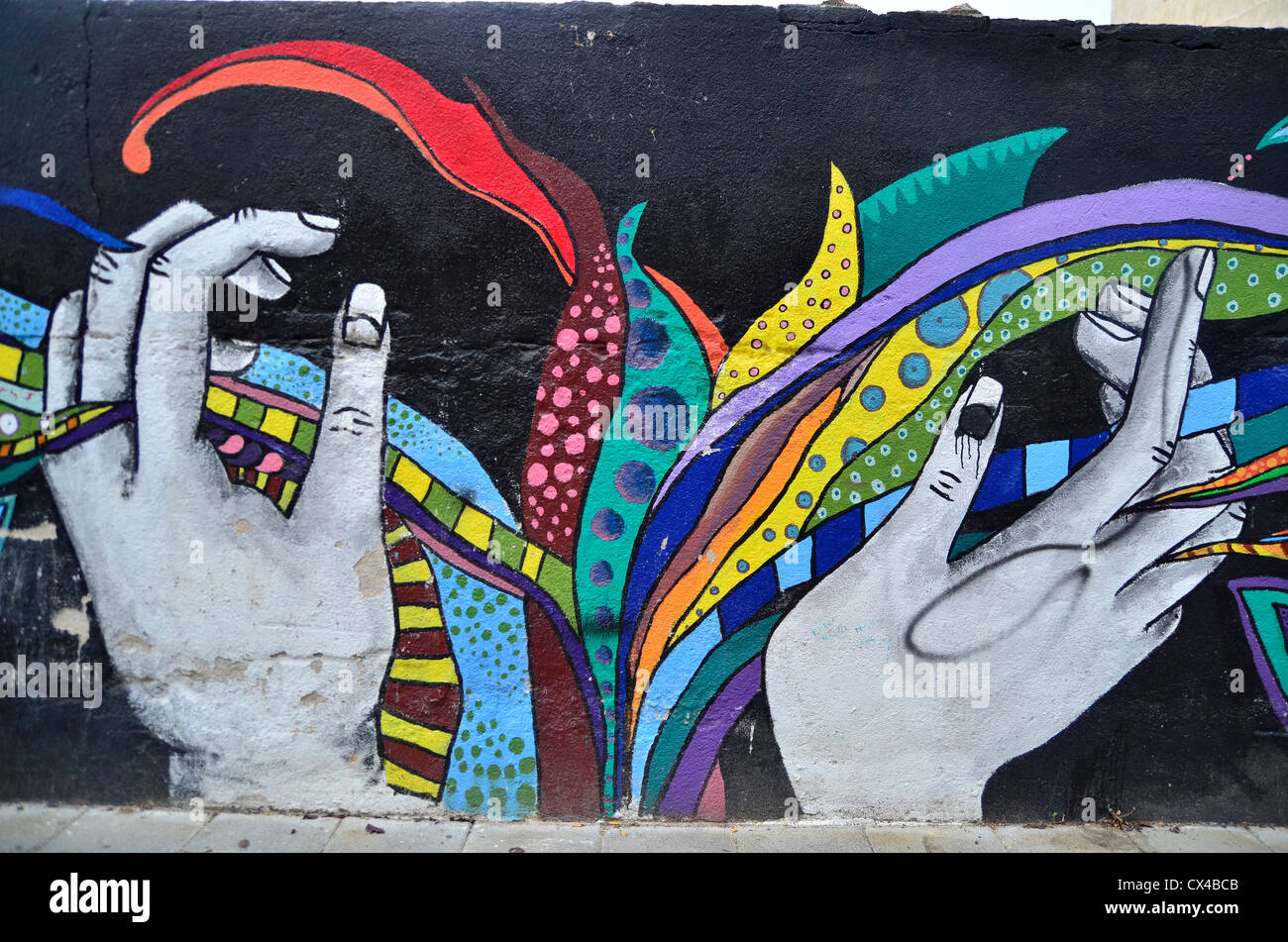 Hands graffiti in Mataró Stock Photo - Alamy