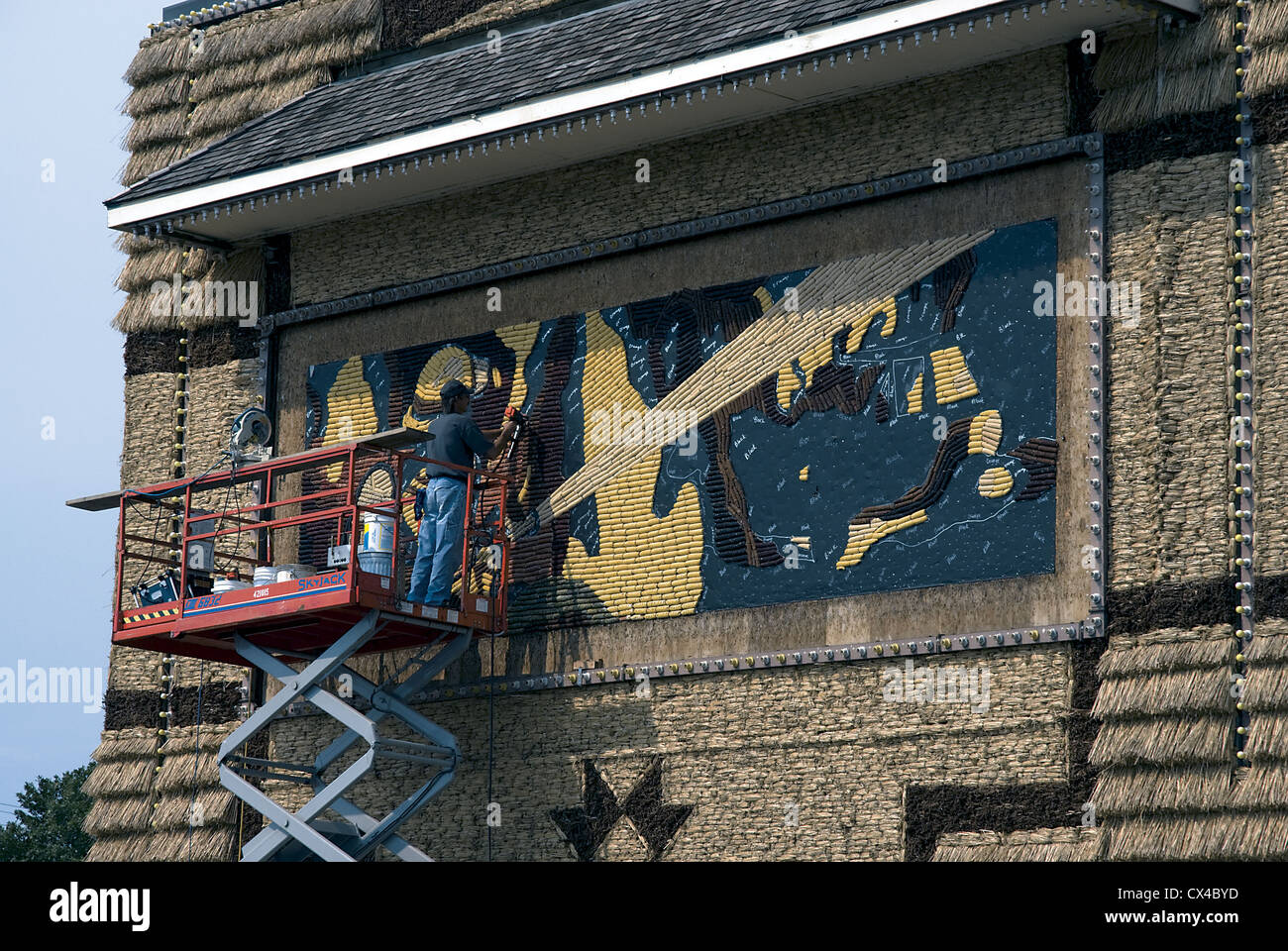 Decorating the coded mural at the Corn Palace Stock Photo - Alamy
