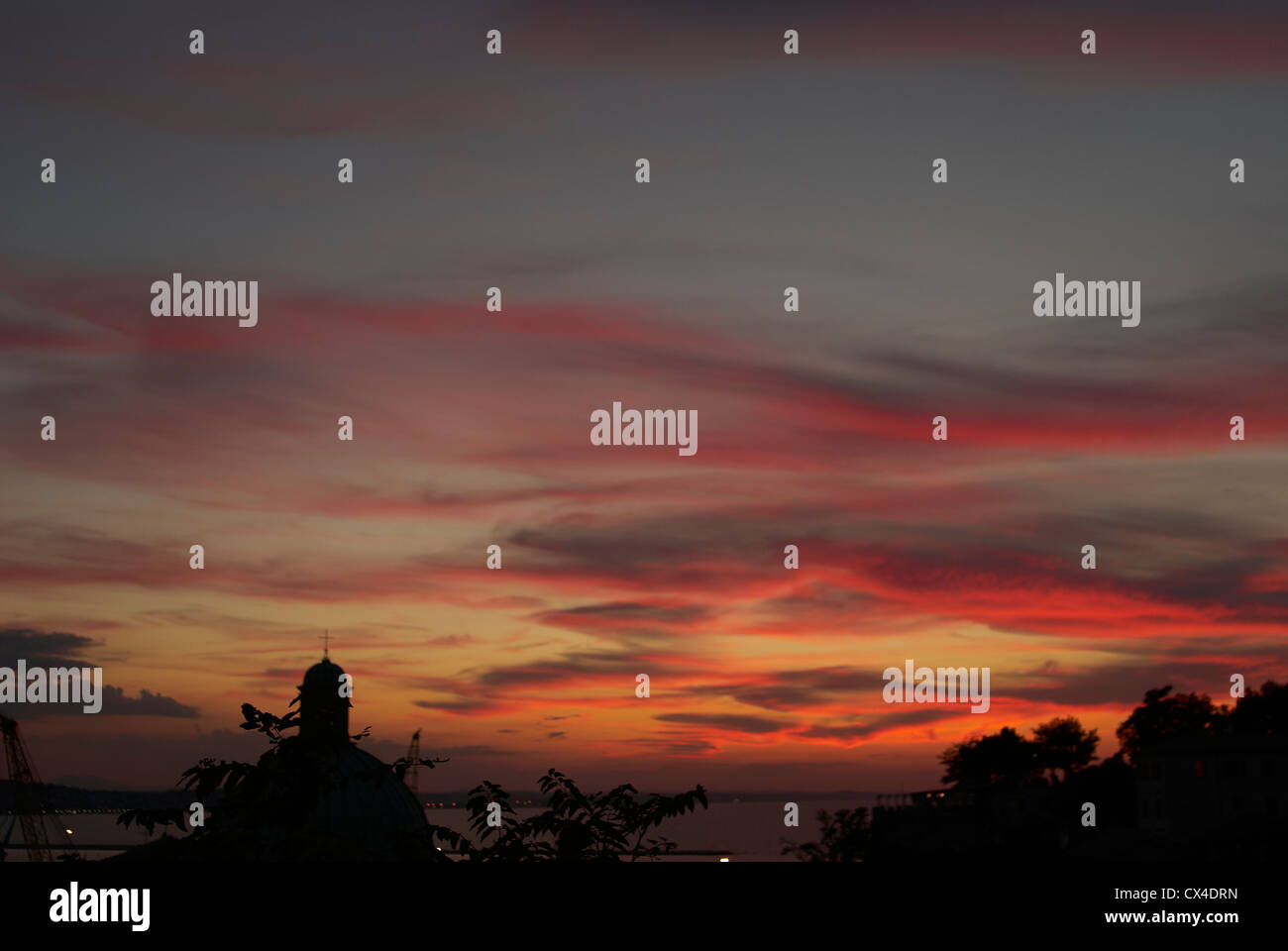 Evening sunset sky With red gold Lighted Clouds Stock Photo - Alamy