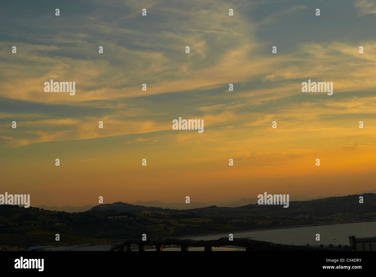 Evening sunset sky With red gold Lighted Clouds Stock Photo - Alamy
