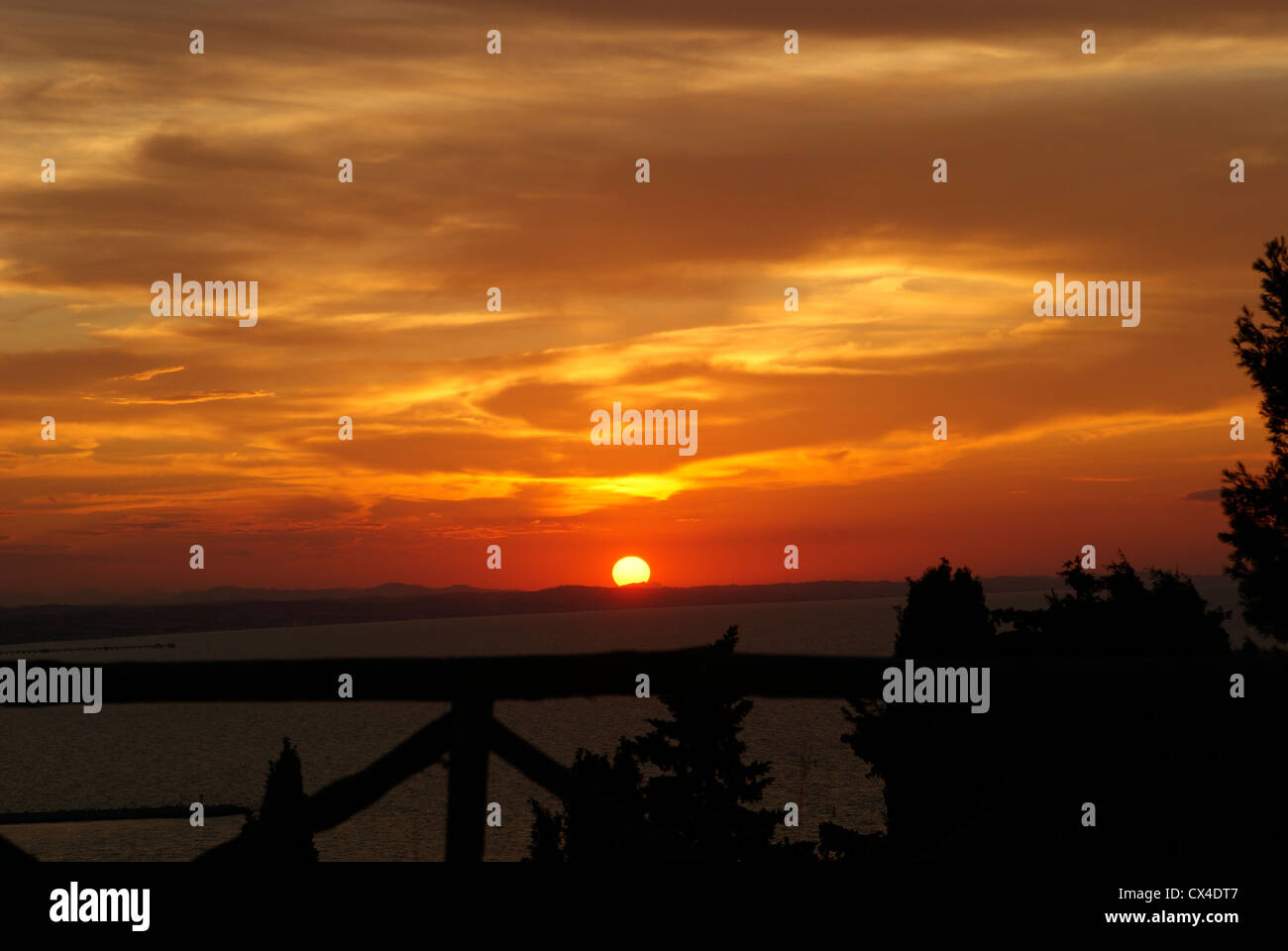 Evening sunset sky With red gold Lighted Clouds Stock Photo - Alamy