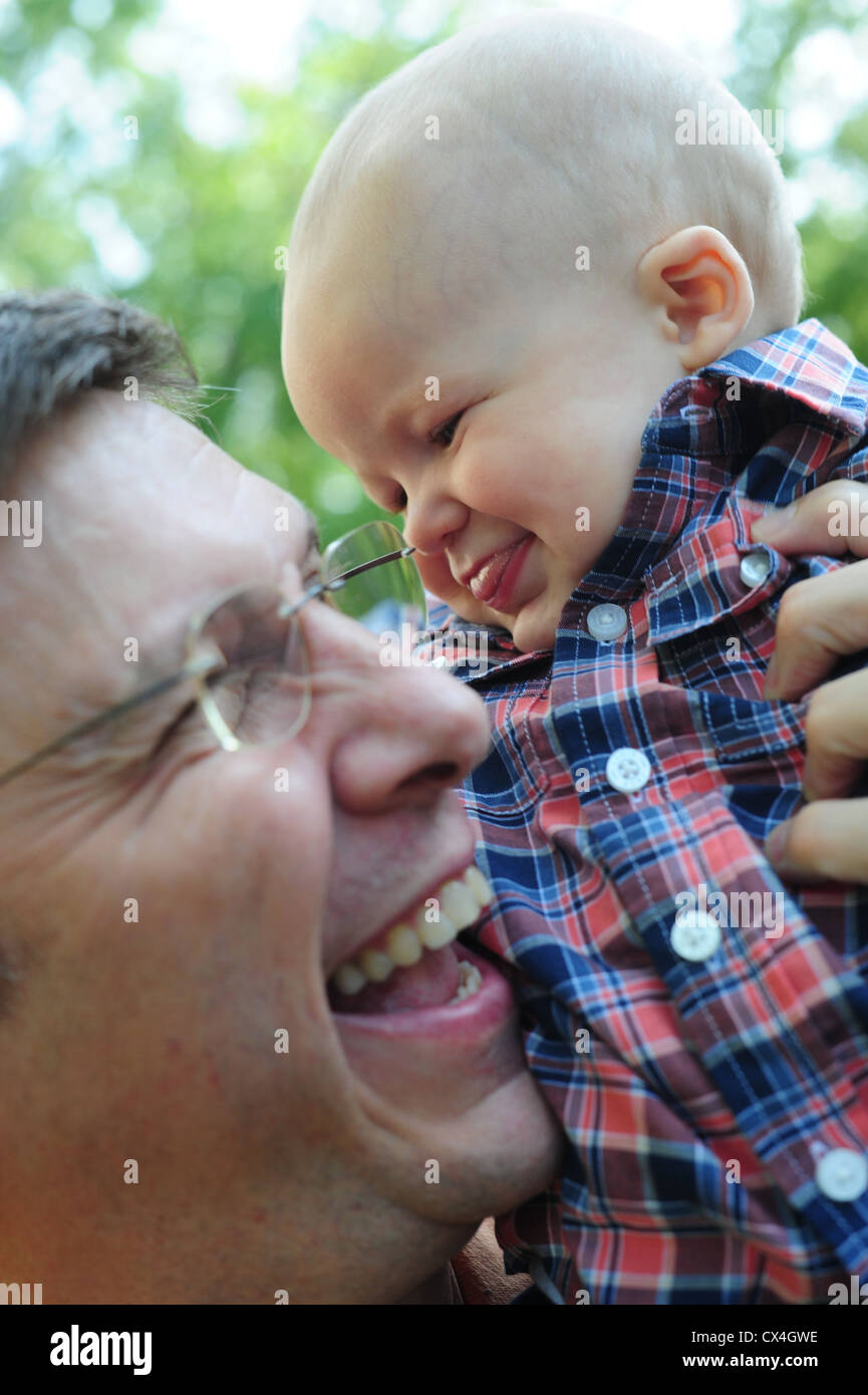 white Caucasian father and son being silly and goofy playful and happy ...