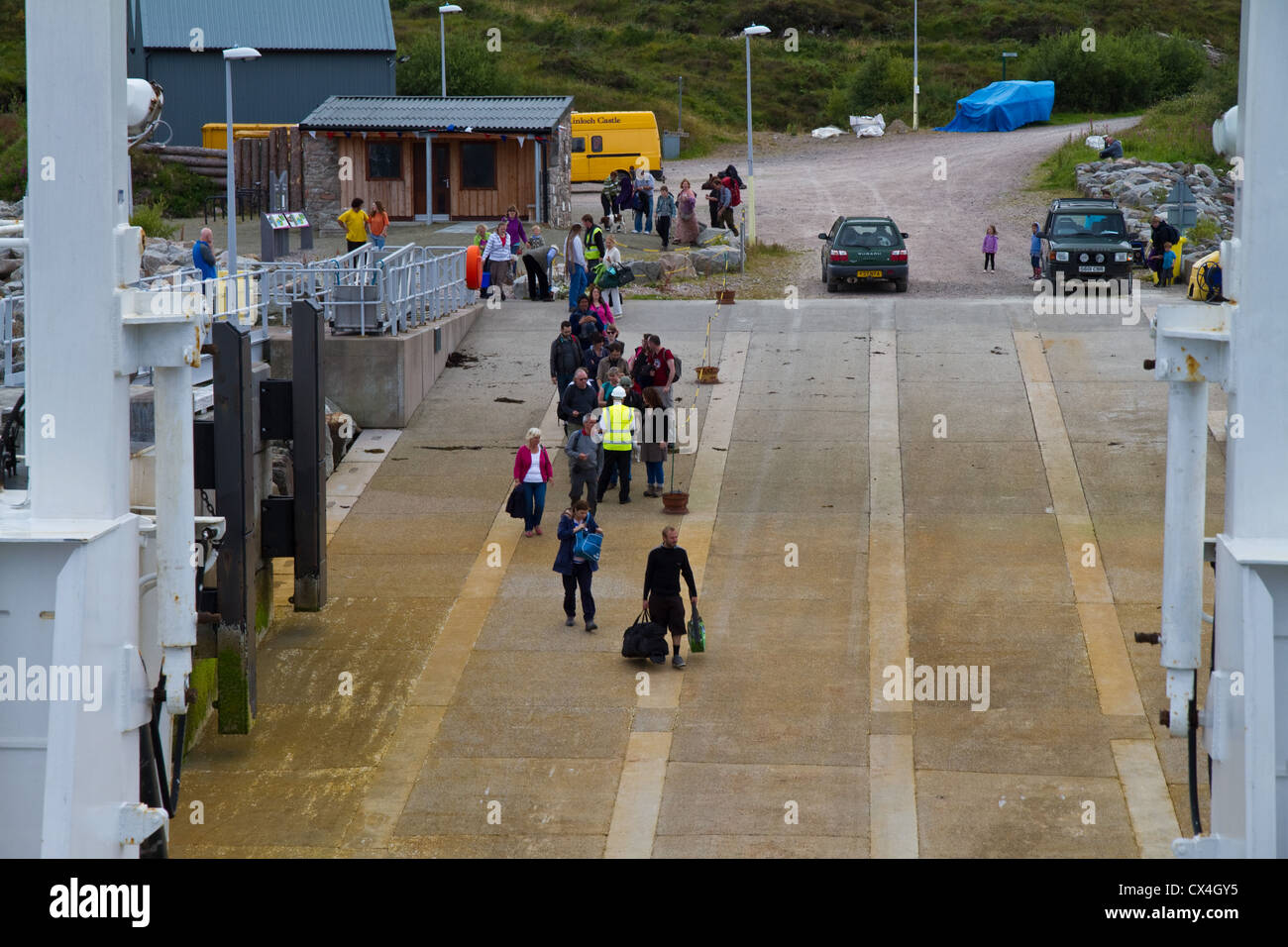 Passengers boarding the CalMac ferry at Rum, the Small Isles, Scotland ...