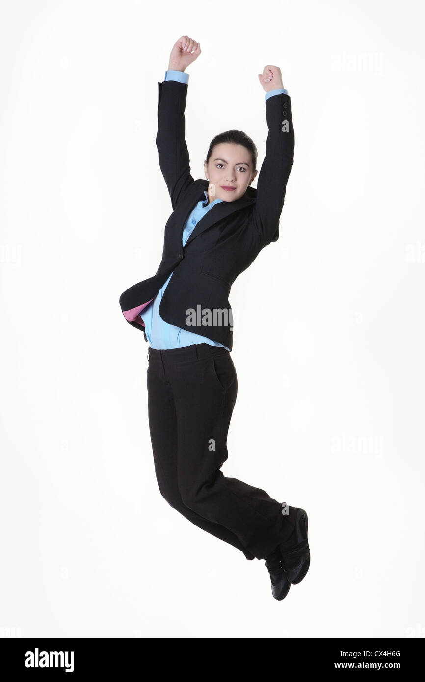 Jumping business woman. Celebrating successful businesswoman in suit ...