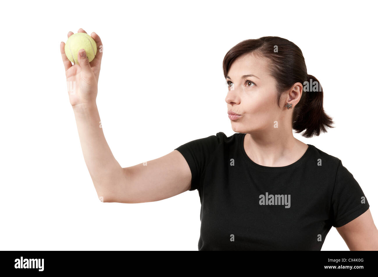 Woman aiming with a tennis ball Stock Photo - Alamy