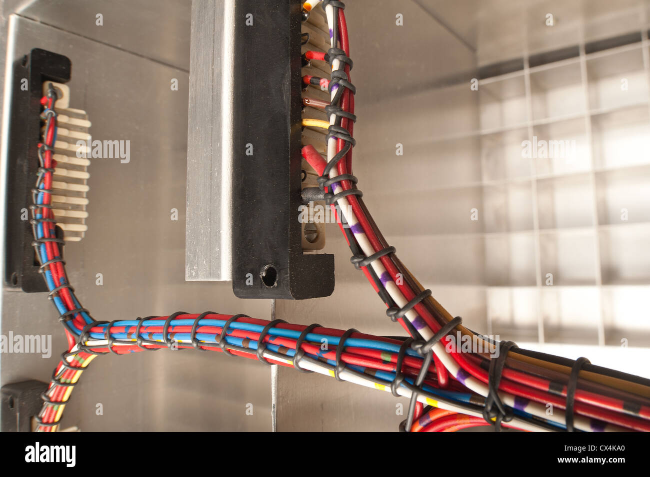 conduit and complicated coded twisted cables into an aluminum enclosure ...