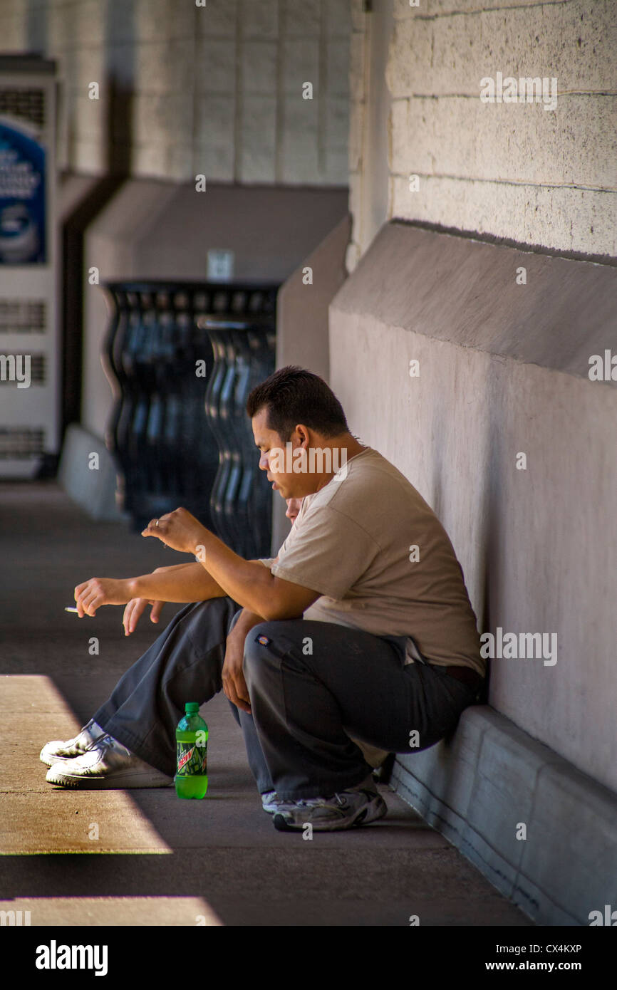 Two men smoking cigarettes hi-res stock photography and images - Alamy