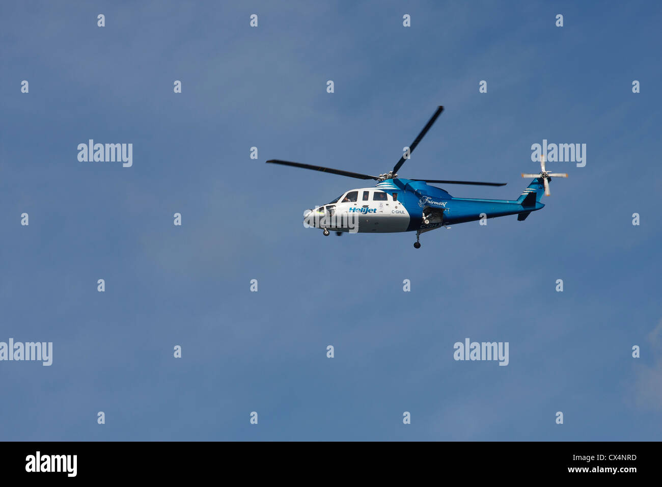 Blue and white helicopter from the Fairmont Hotel Waterfront Hotel in ...